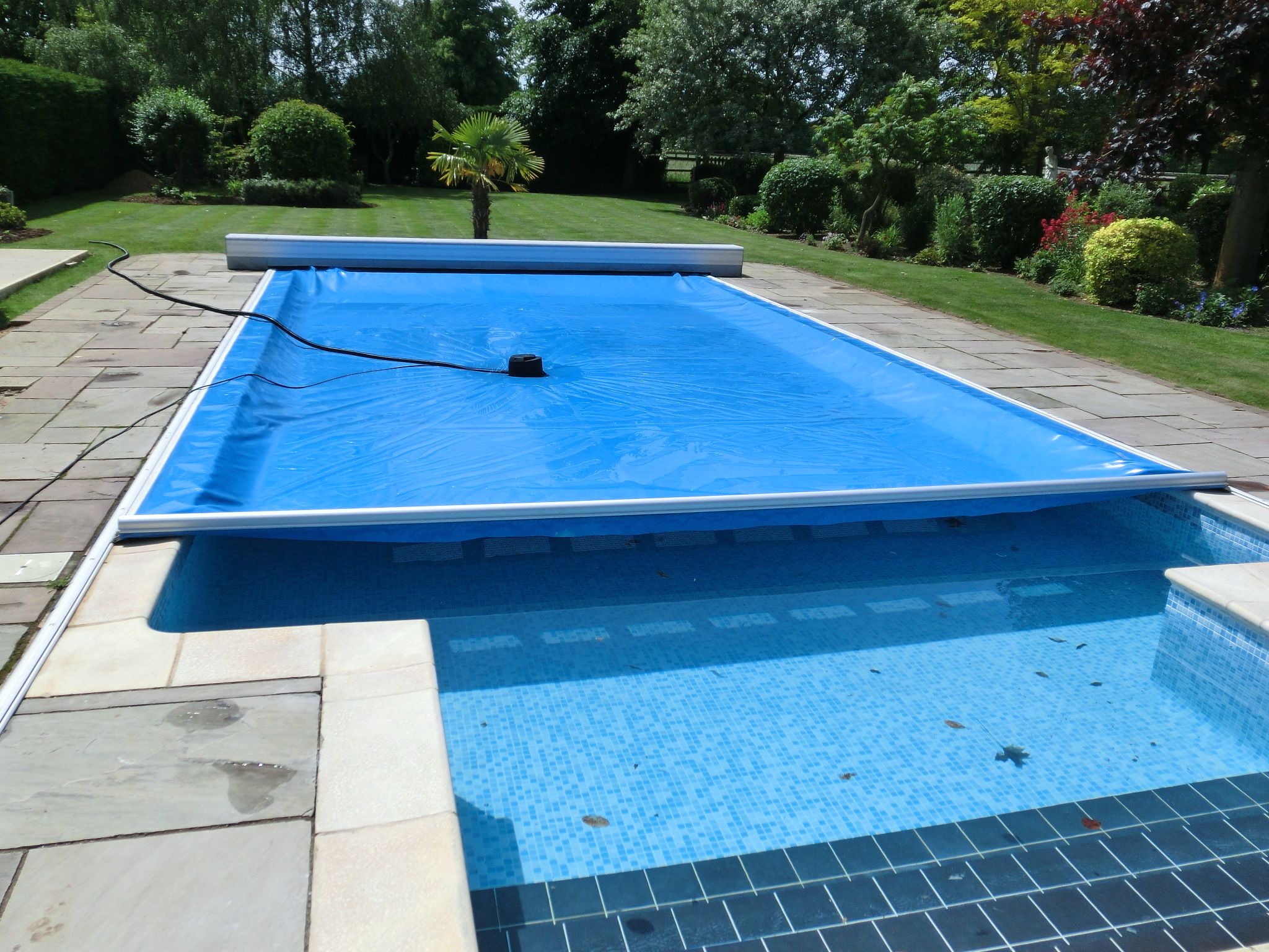 Poollock – כיסוי בטיחותי לבריכה